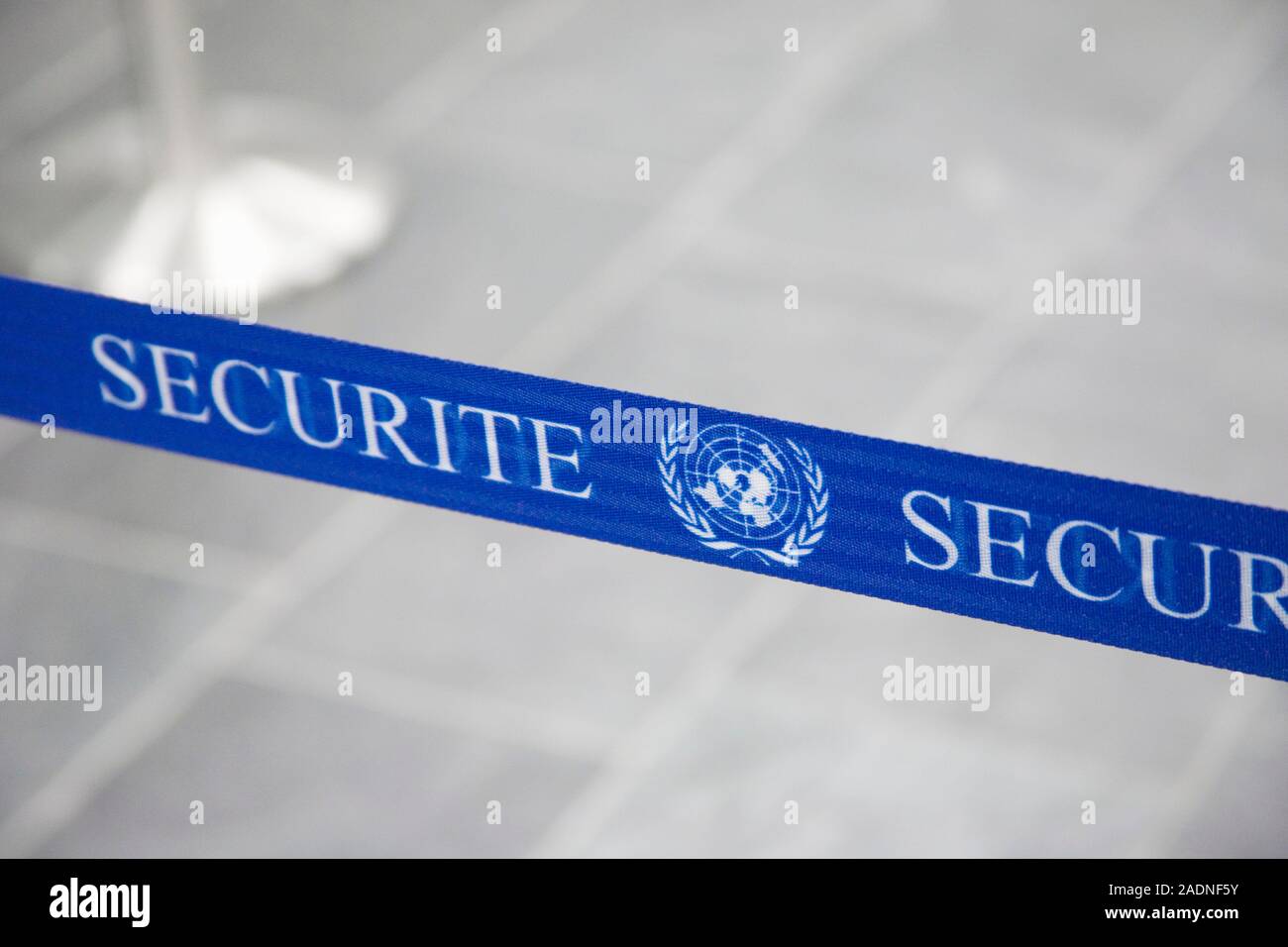Security belt barrier, displaying the United Nations logo. Photographed ...