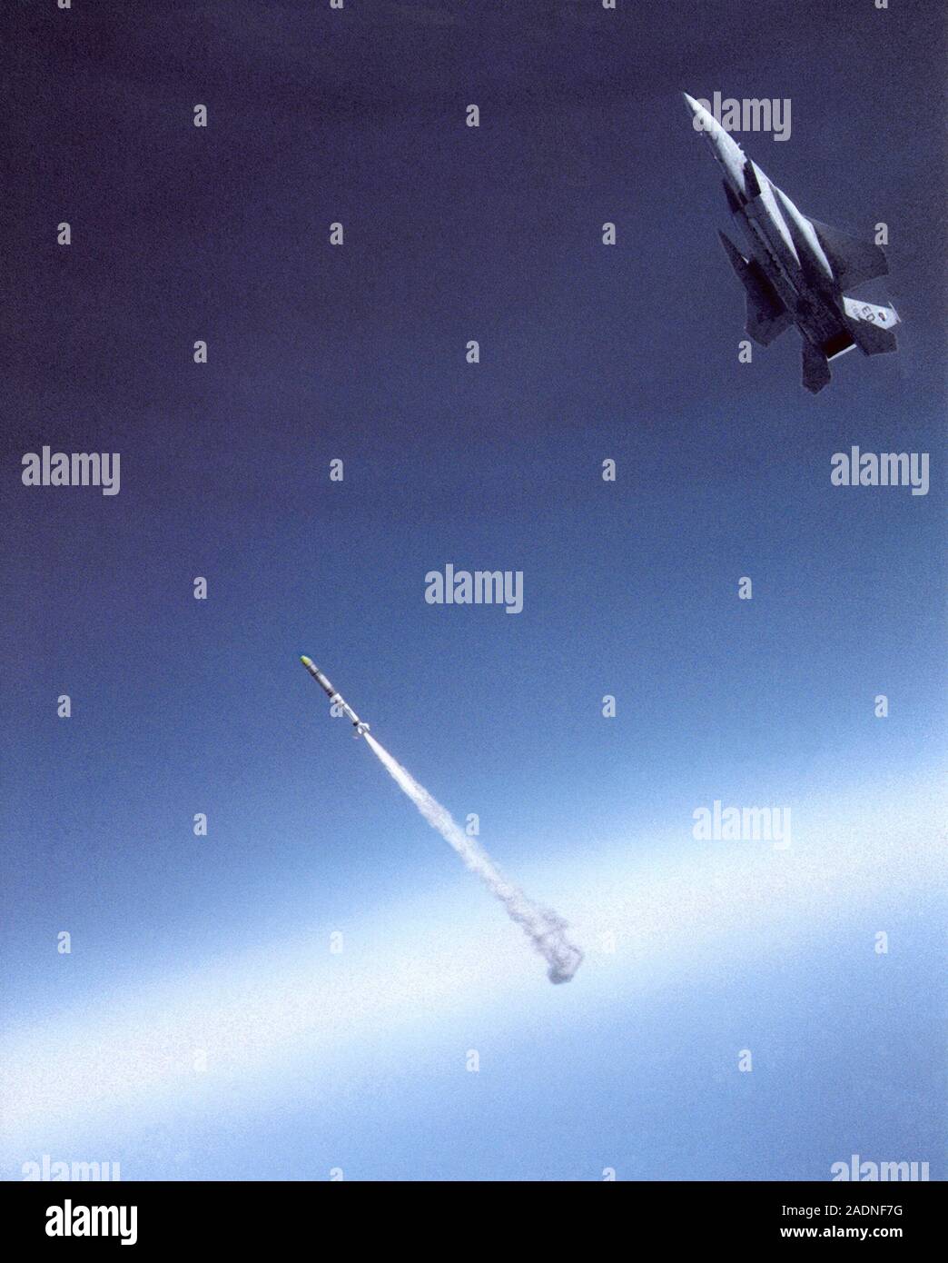 Missile flight test. F-15 Eagle aircraft releasing an anti-satellite ...