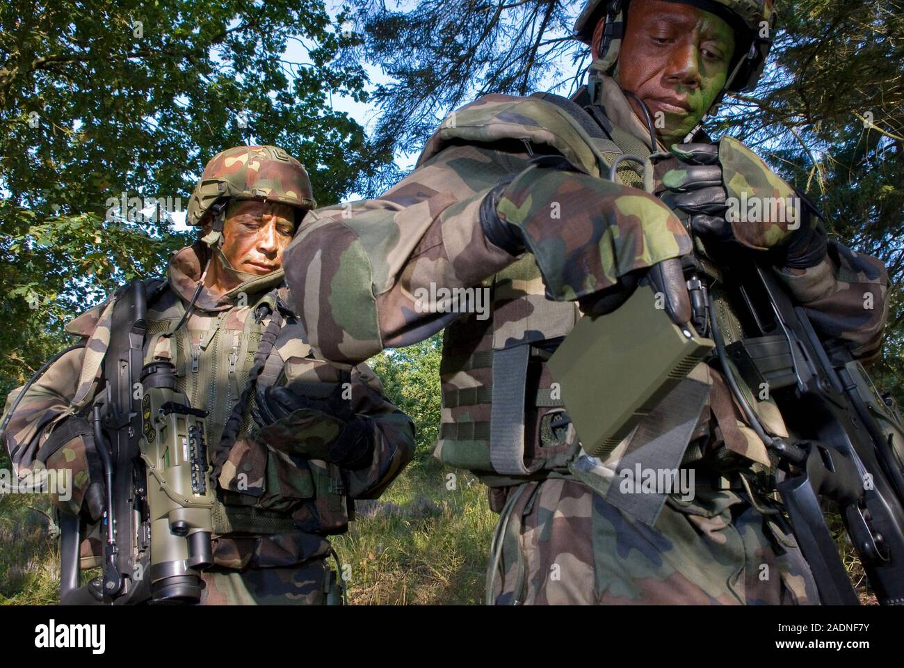 Military power supply. Soldiers testing the FELIN infantry combat ...