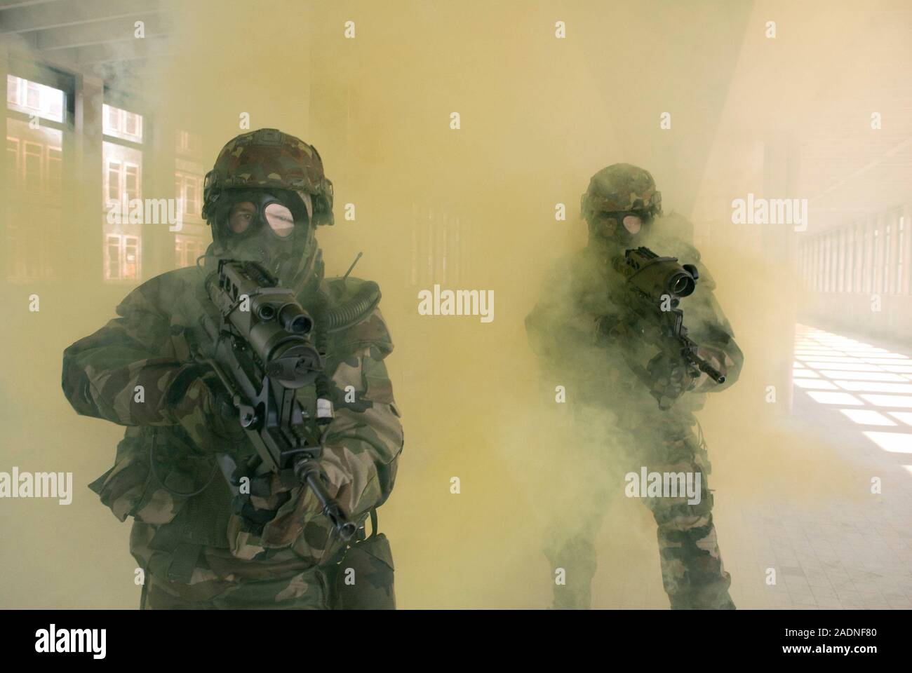 Military gas masks. Soldiers testing their NBC (nuclear, biological and ...