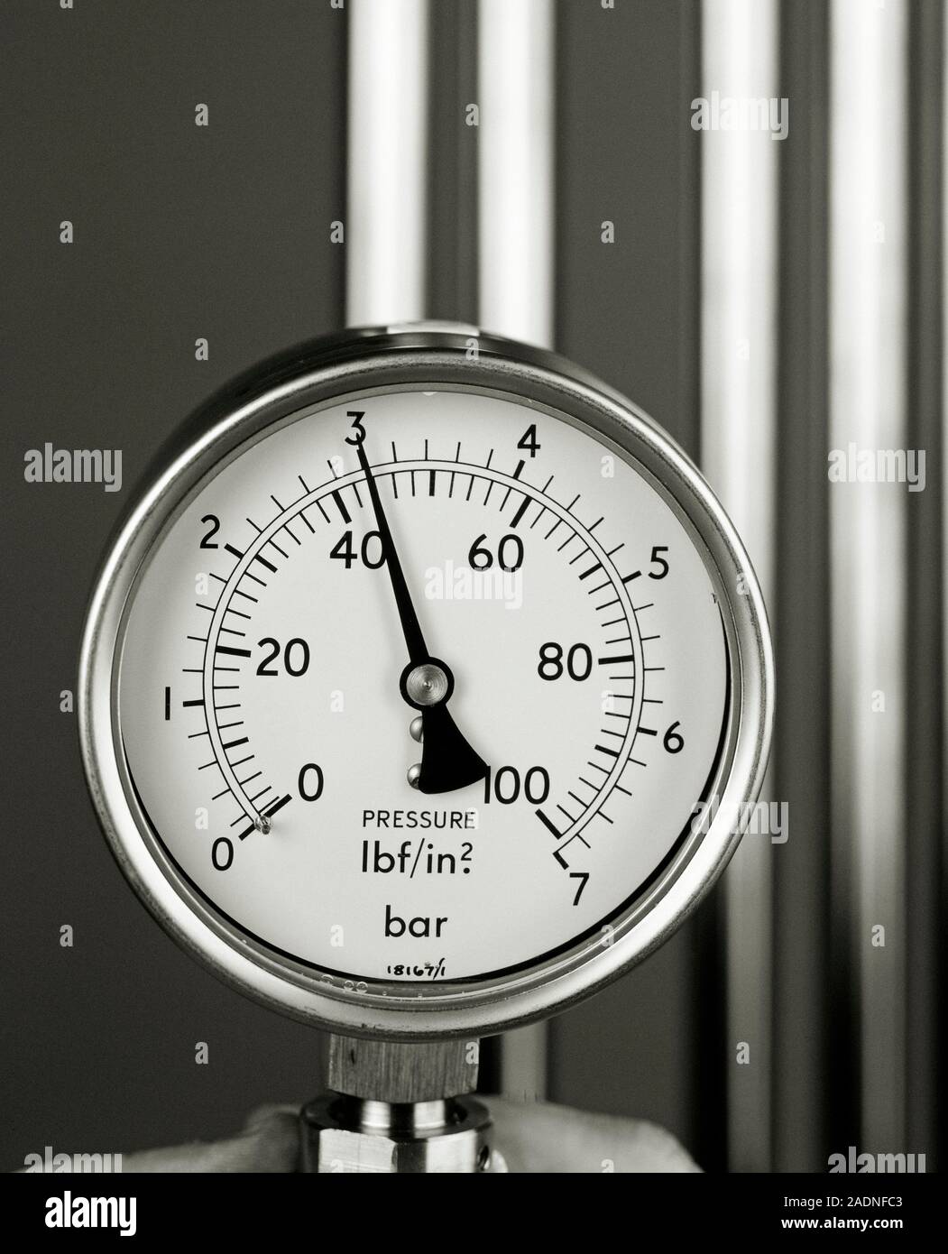 Pressure gauge measuring pressure in pounds of force per square inch ...