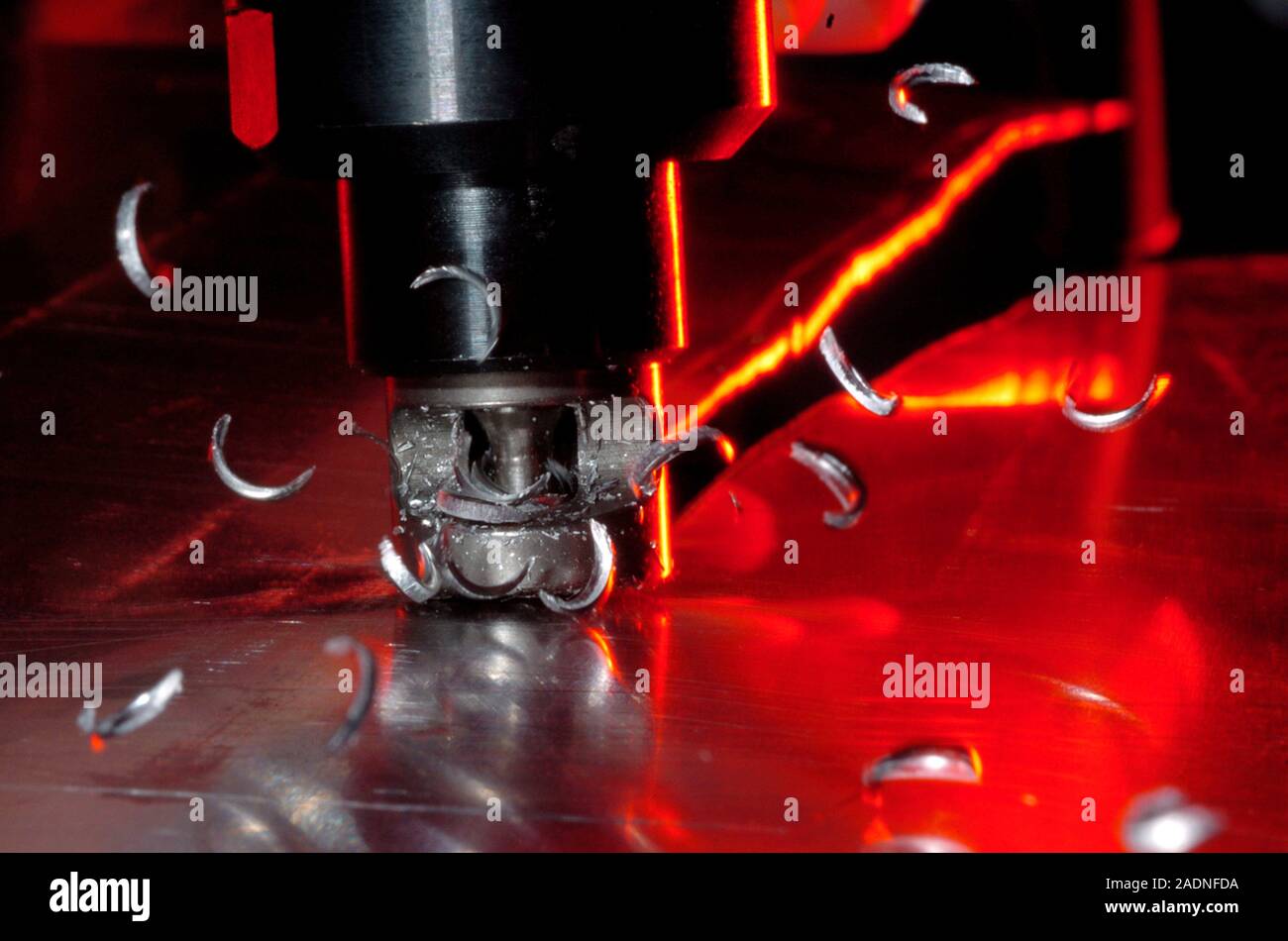 Metal cutting machine in use. The cutting part of the machine is ...