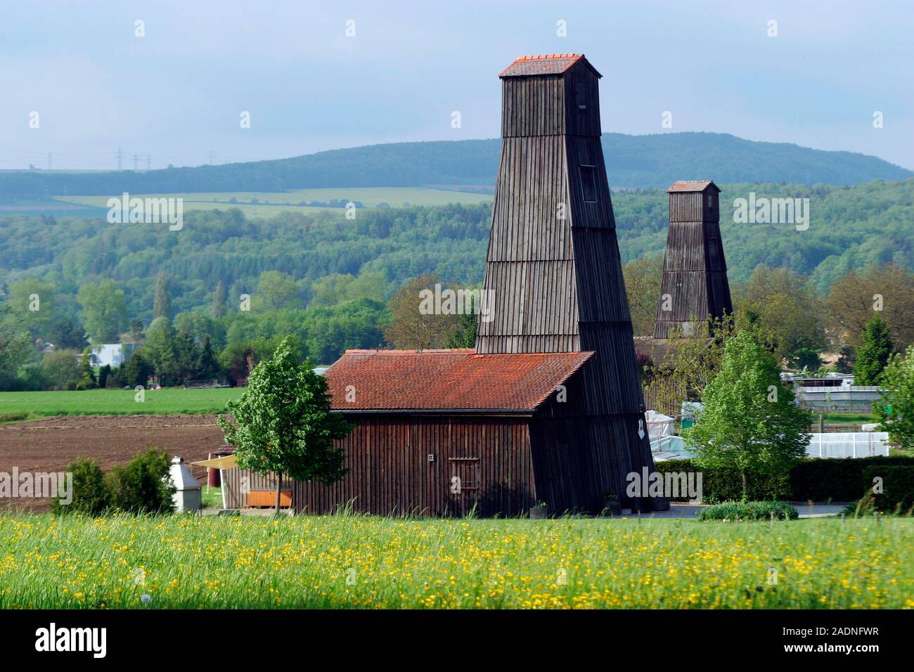 Disused towers at a former rock salt mine. Rock salt, or halite, is the ...