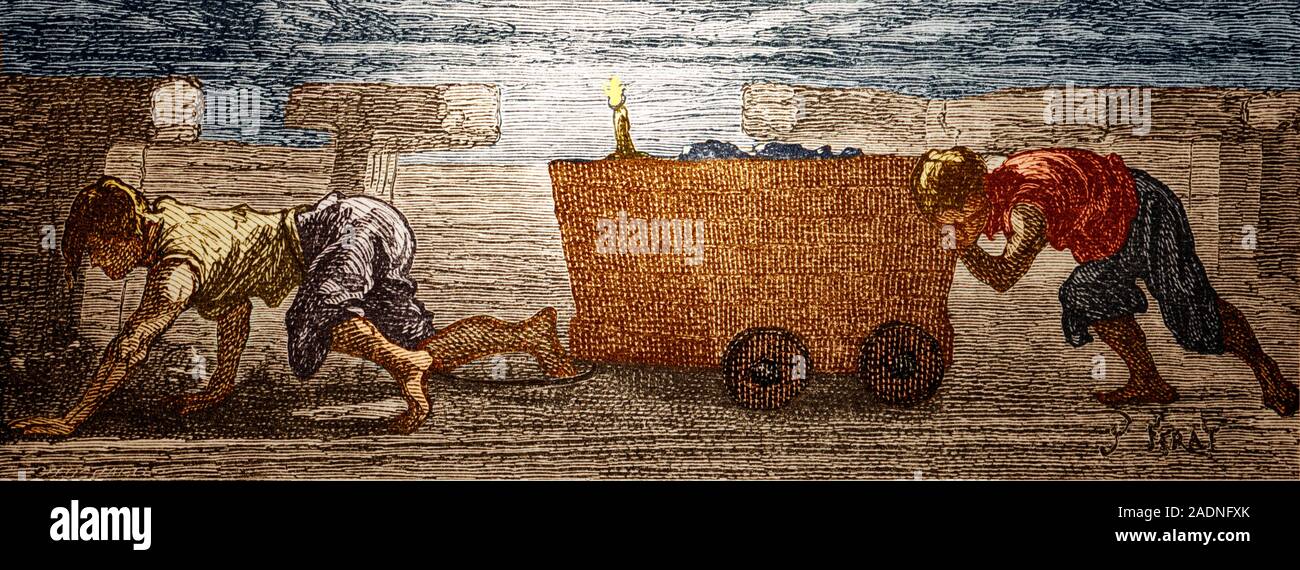Boys working in a mine. Historical artwork of two young boys pushing a ...