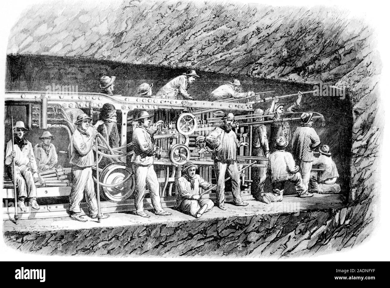 Tunnelling machine. Engraving of a pneumatic boring machine being used ...