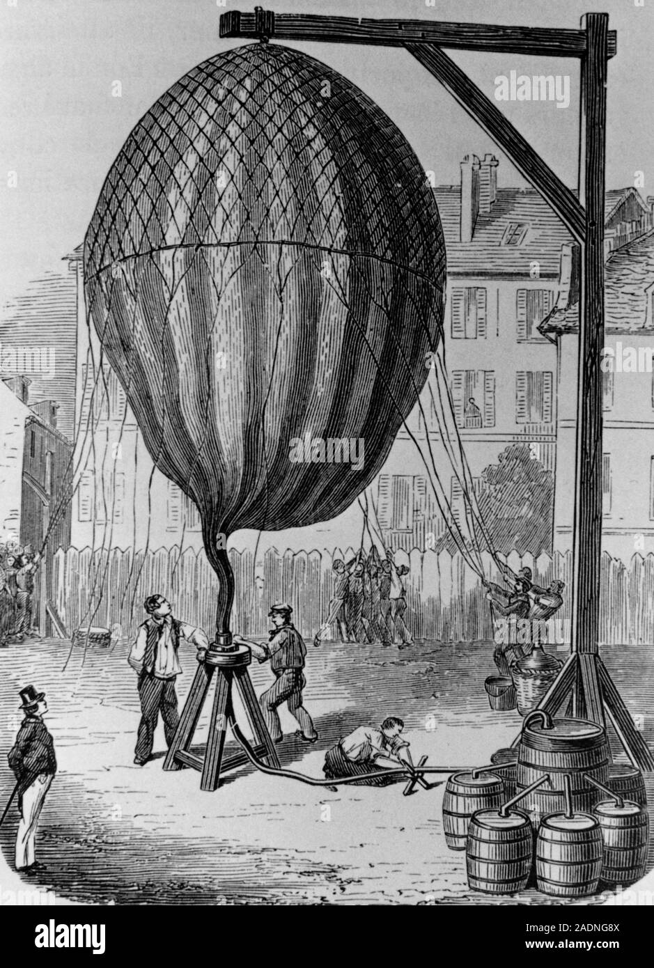 Hydrogen balloon. Engraving of the first filling of a balloon with ...