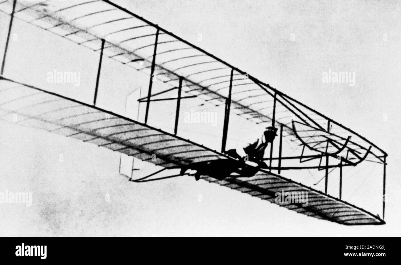 Early glider. Wilbur Wright, one of the famous Wright brothers, flying a glider in 1902. It was ...