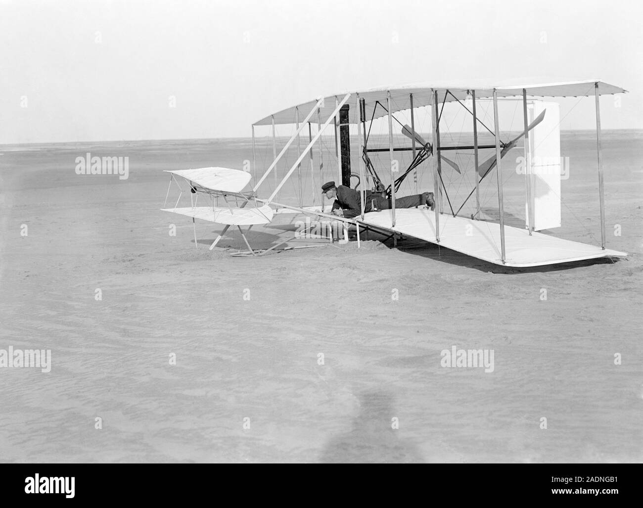 Wright Flyer. Wilbur Wright crash landing the Wright Flyer on December ...