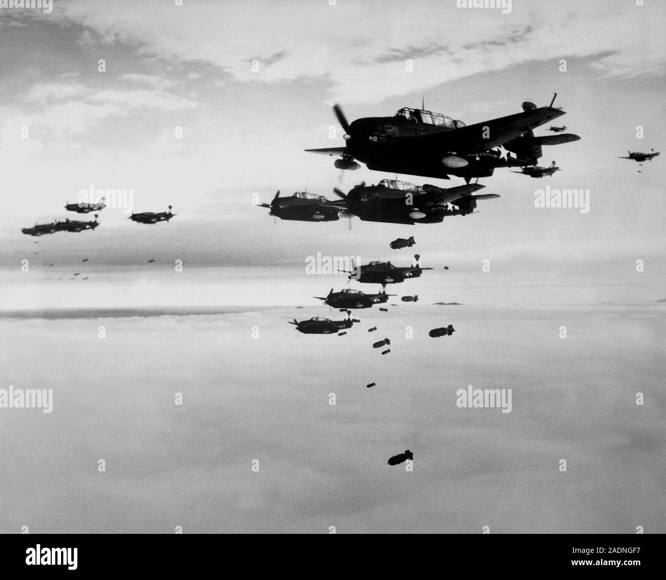 WWII bombing of Japan. US bomber planes in flight, dropping explosives ...