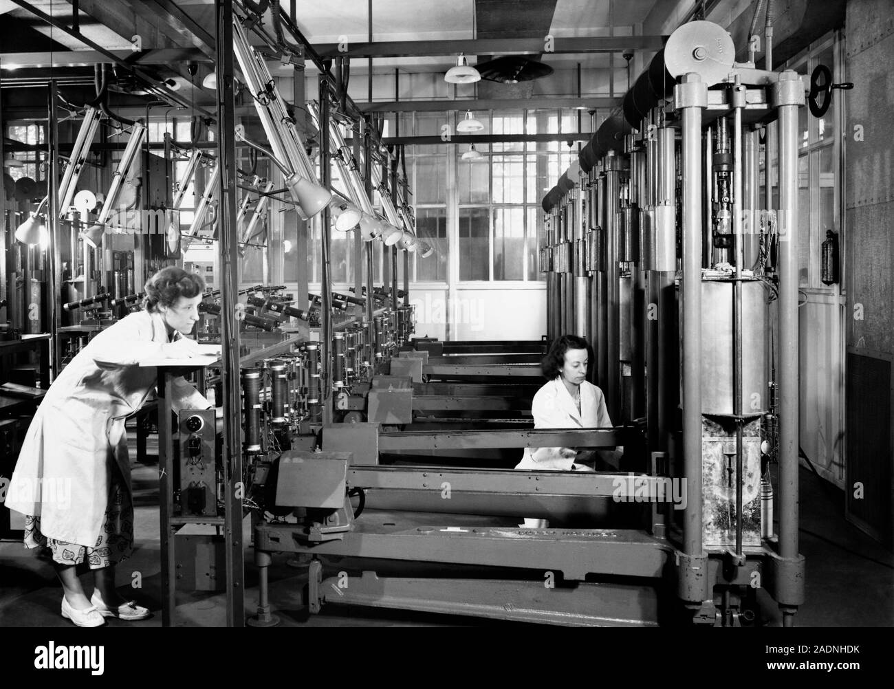 Materials science laboratory. Laboratory technicians analysing and ...