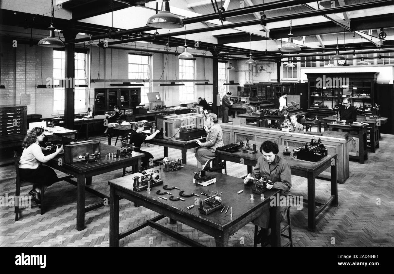 Metrology gauge room. Researchers working with high-precision gauges in ...
