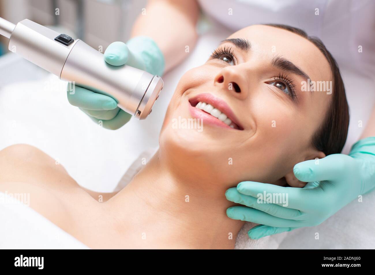 Close up of happy lady undergoing modern oxygen meso therapy Stock ...
