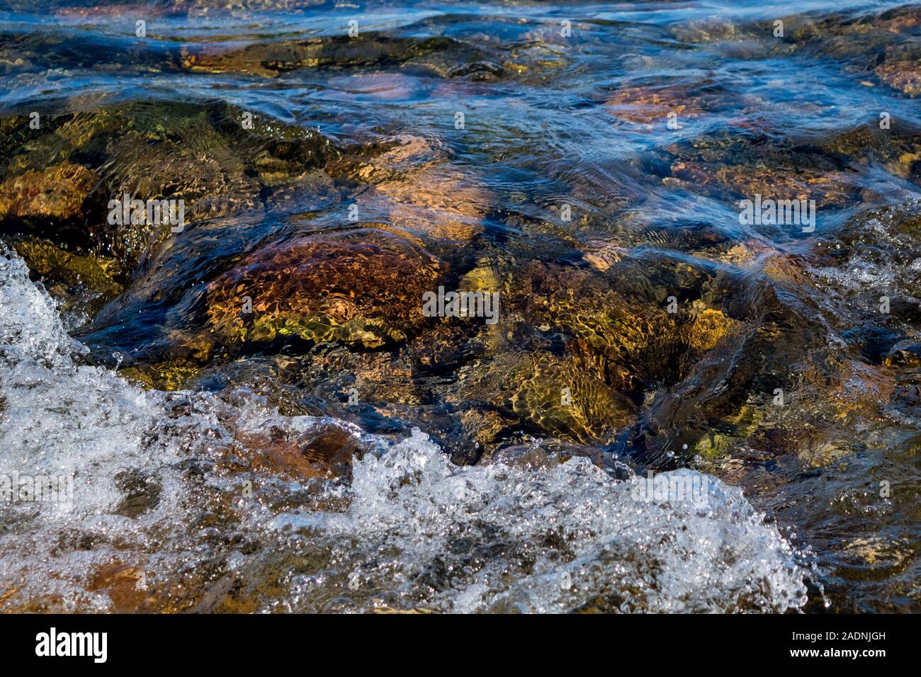 pebbles at the bottom of the river Stock Photo - Alamy