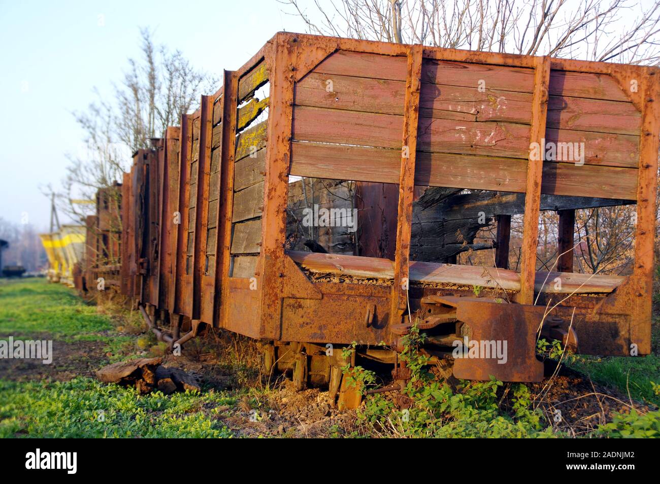 Old forgotten train on the tracks. A rusty and damaged freight railway ...