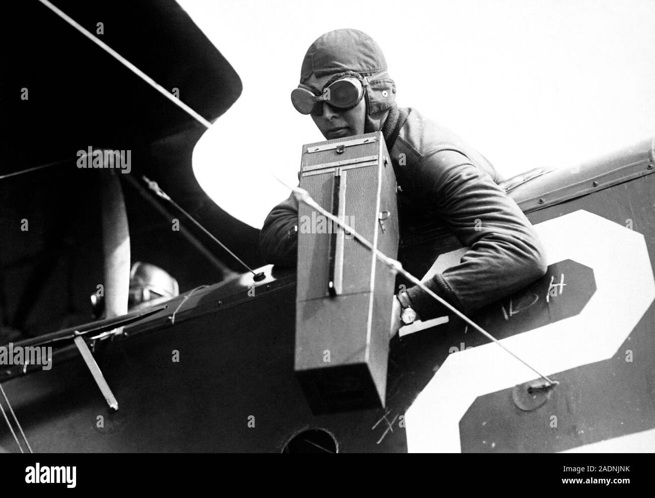 First World War aeroplane camera. Aviator demonstrating the use of a ...