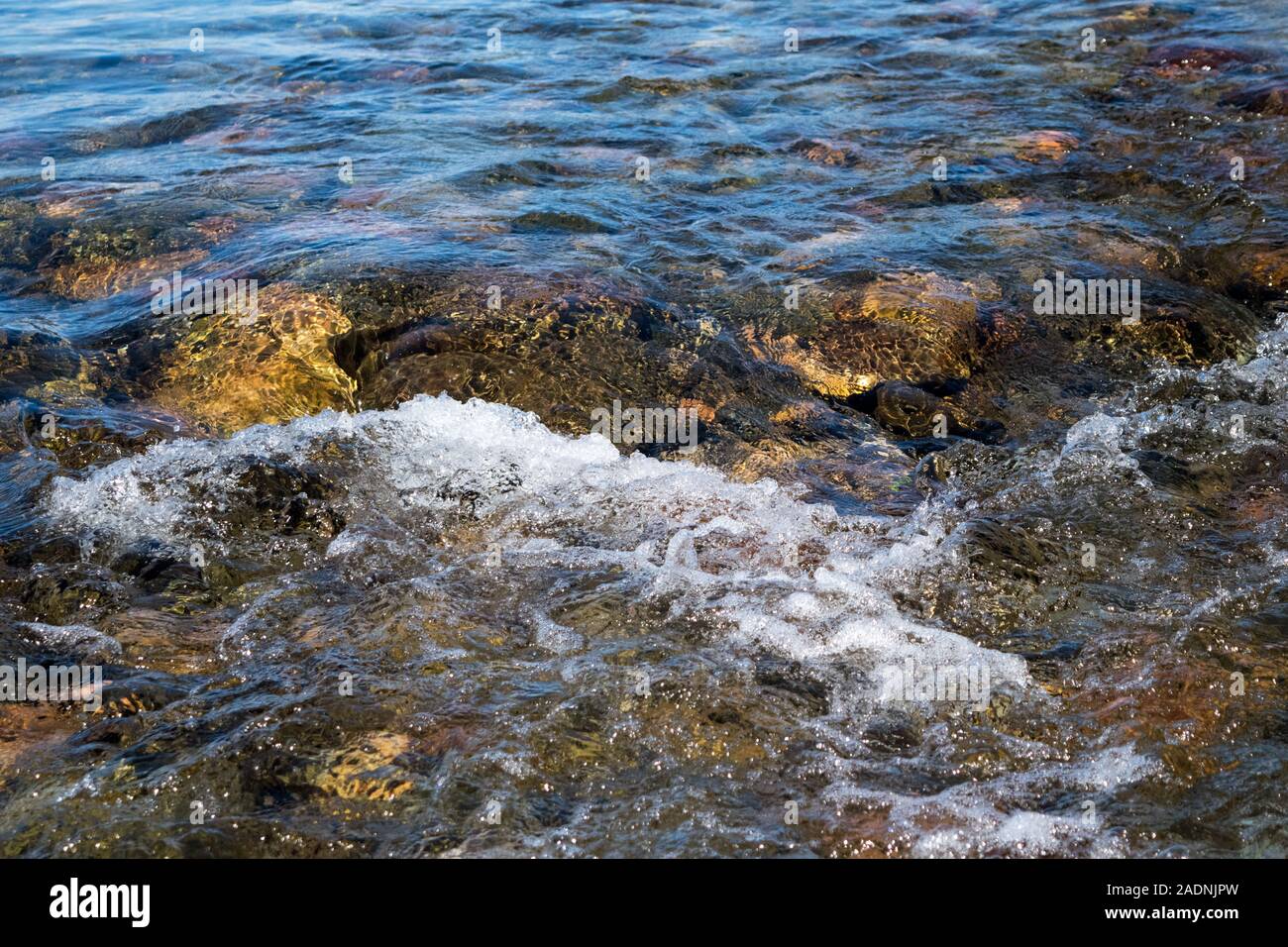 pebbles at the bottom of the river Stock Photo - Alamy