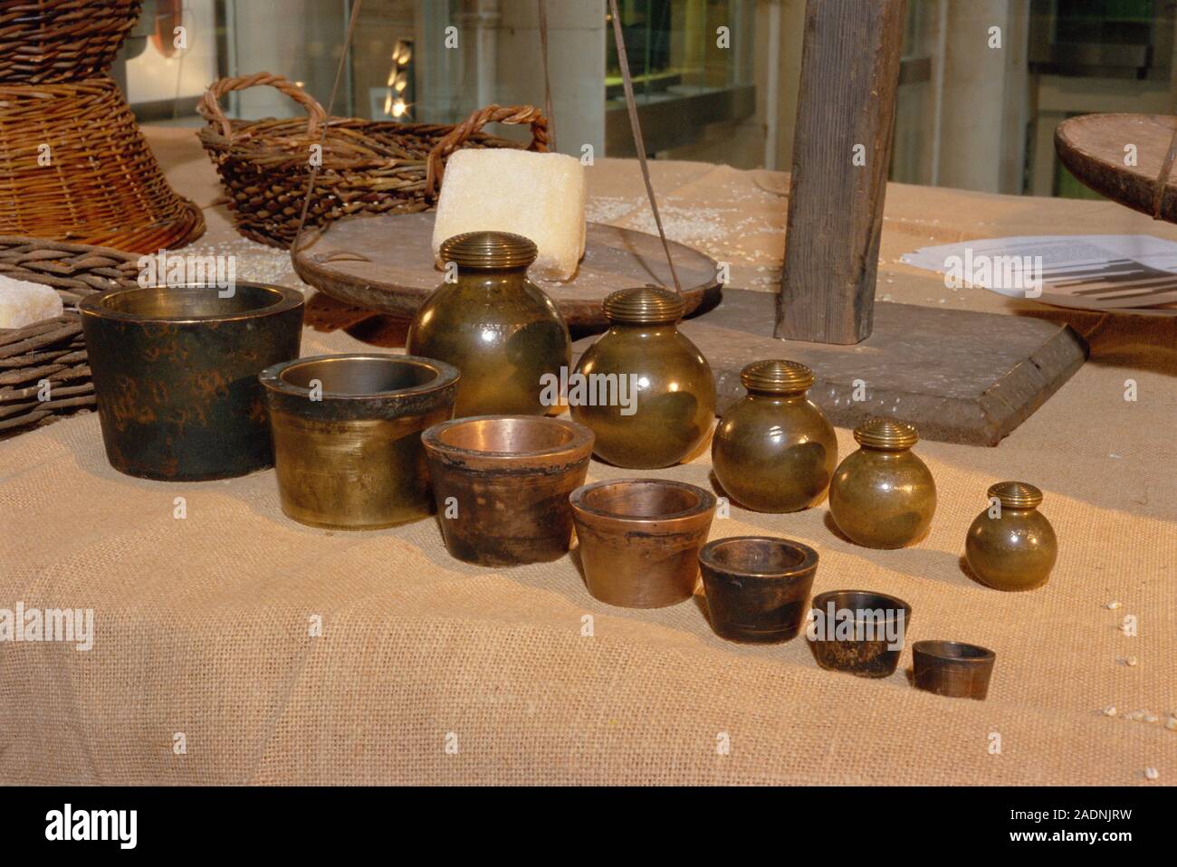 Standard weights and measures. These English weights (back row) and ...