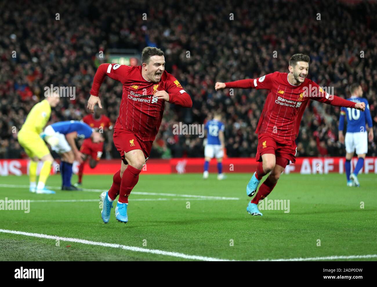 Liverpool's Xherdan Shaqiri (left) celebrates scoring his side's second ...