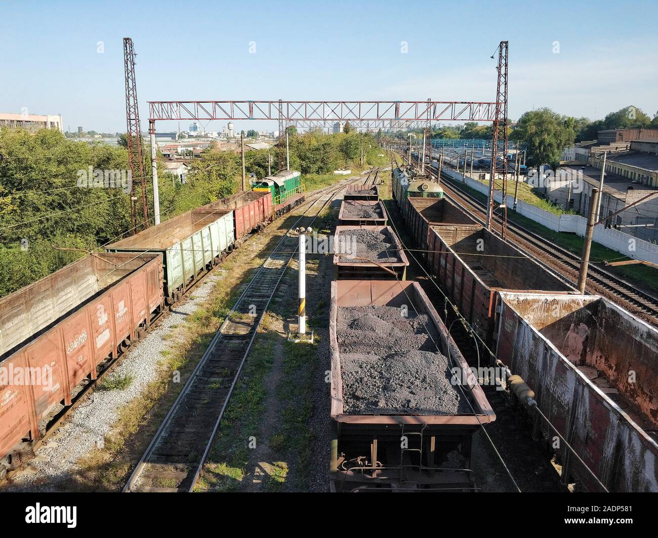 Railway. Freight wagons carrying different loads. Heavy industry ...