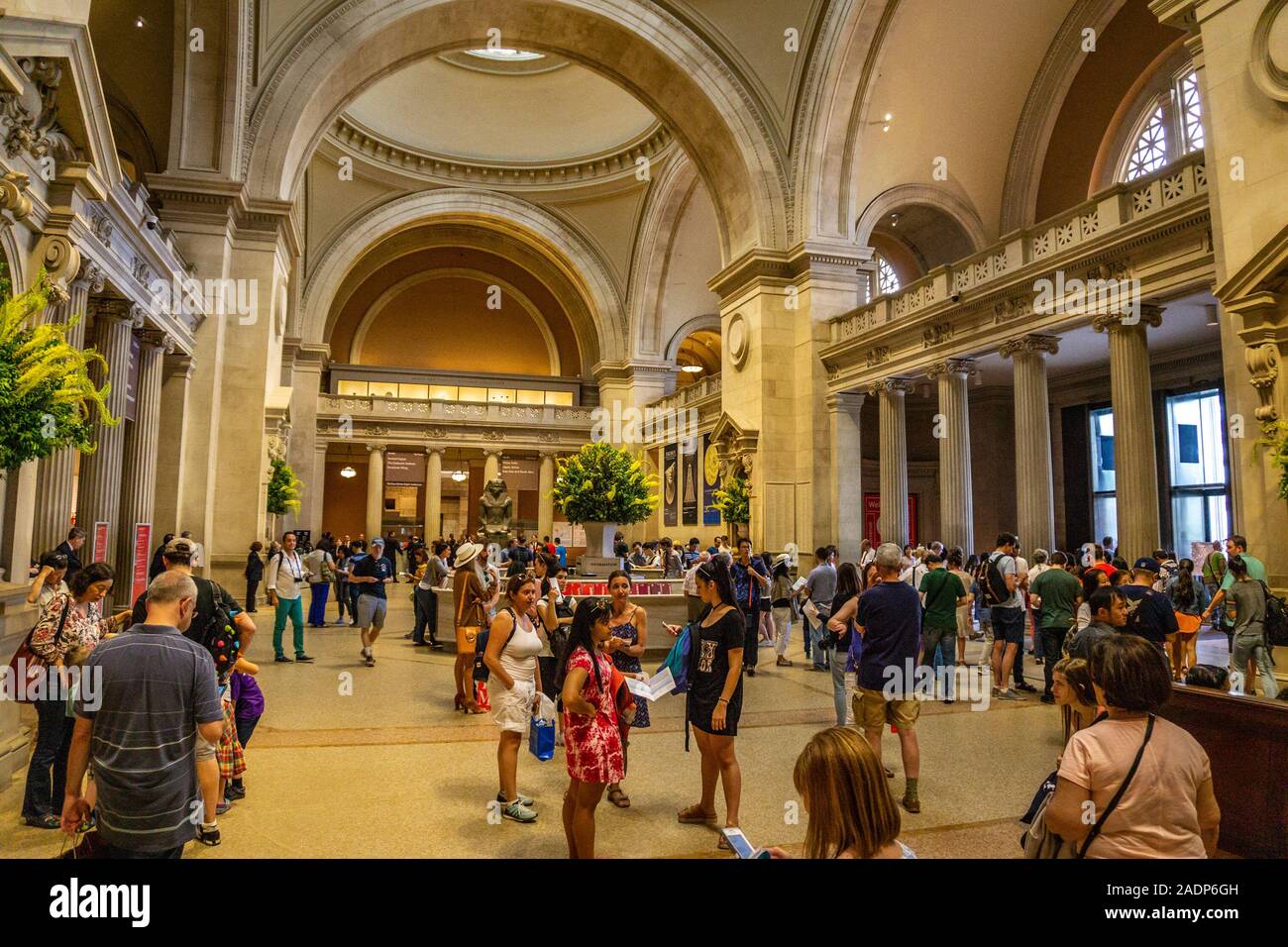 Lot of people and Tourists walk inside the Metropolitan Museum of Art ...