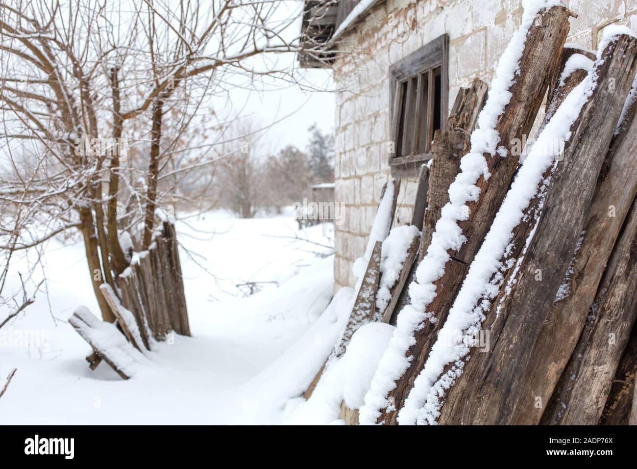 Winter countryside landscape, dilapidated abandoned ruined building ...