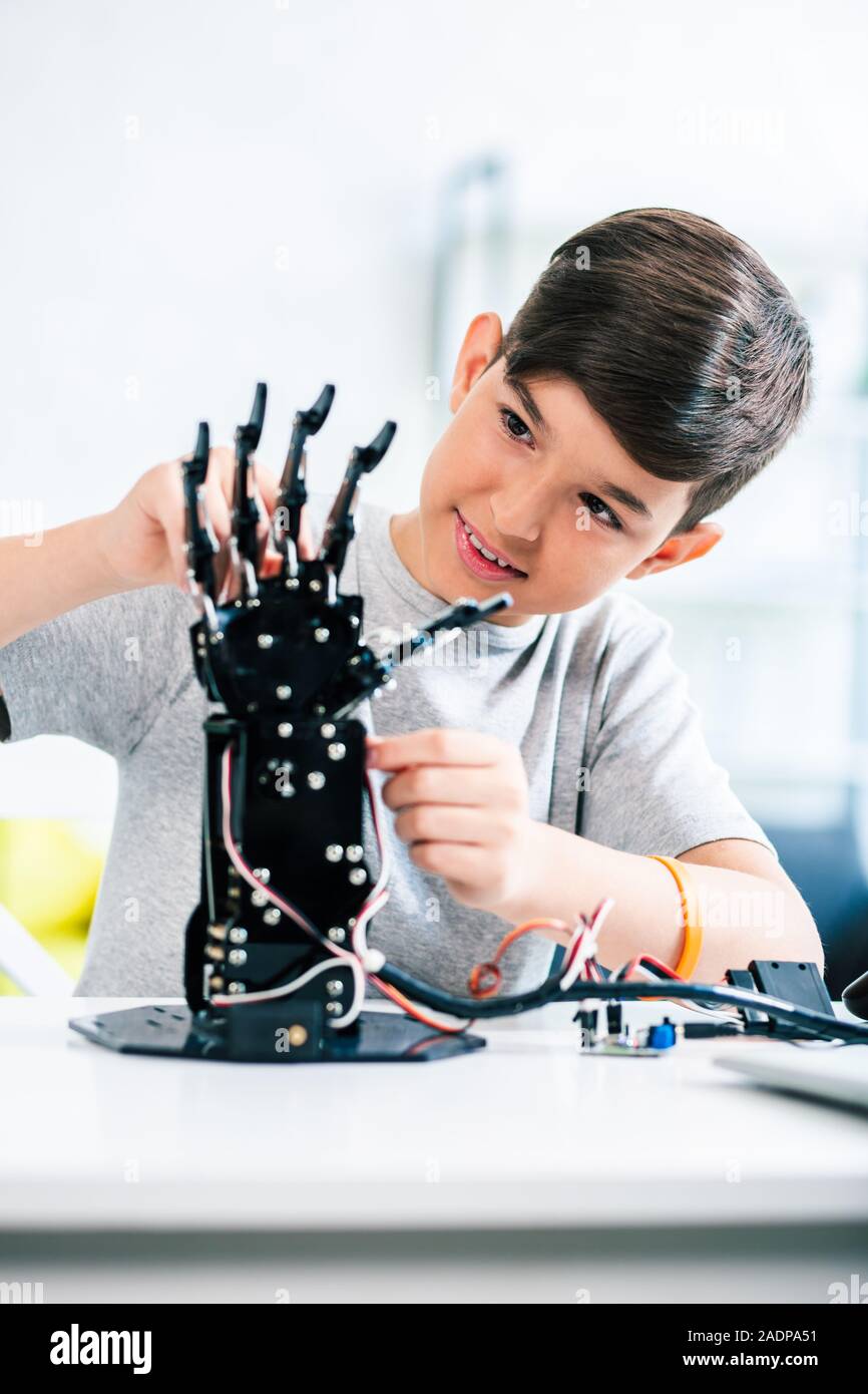 Nice smart boy being involved in engineering classes Stock Photo - Alamy