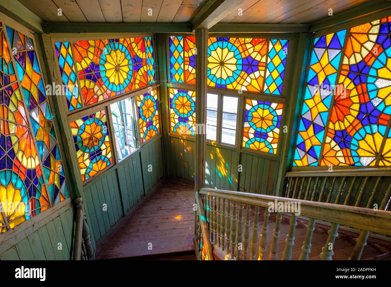 Colorful windows in the starwell of a historic Georgian home, Tbilisi ...