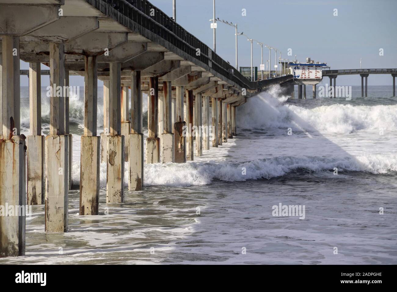 High Tide at Ocean Beach Pier Stock Photo - Alamy