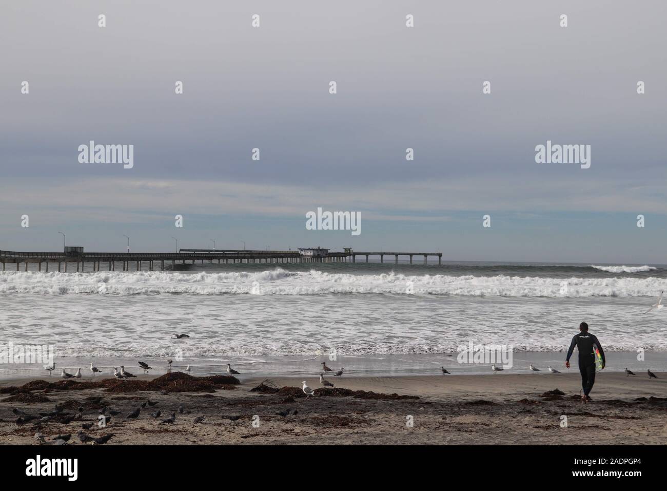 High Tide at Ocean Beach Pier Stock Photo - Alamy