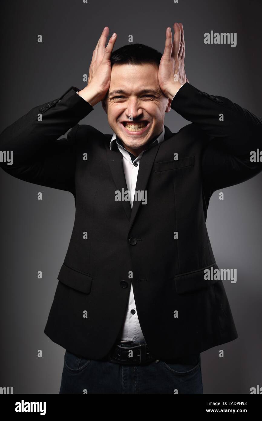 Angry business man in suit loud screaming with wide open mouth and ...