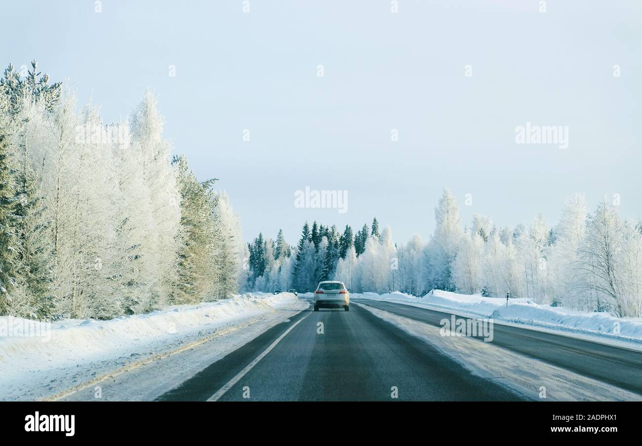 Landscape with car road at snowy winter Lapland reflex Stock Photo - Alamy