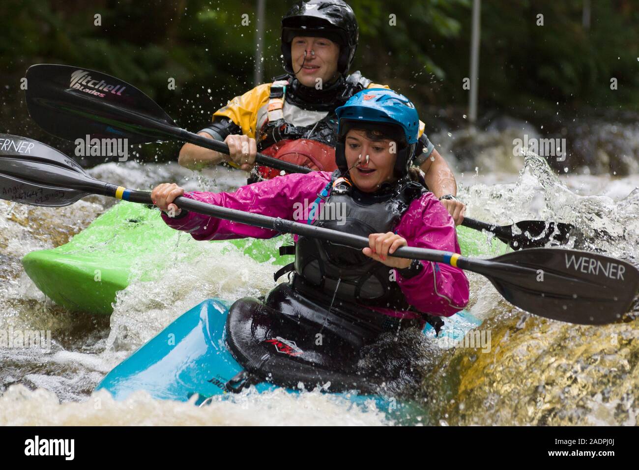 Man woman male female paddle paddling hi-res stock photography and ...