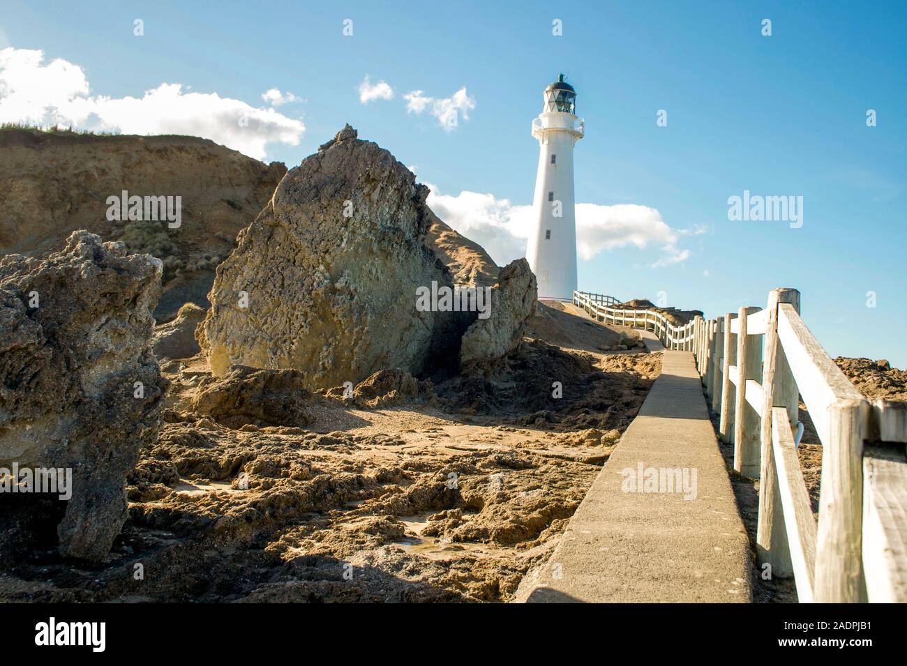 Walking up the steep pathway to the lighthouse Stock Photo - Alamy