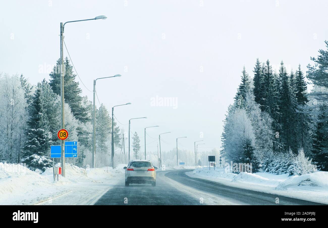 Landscape car on road at snowy winter Lapland reflex Stock Photo - Alamy