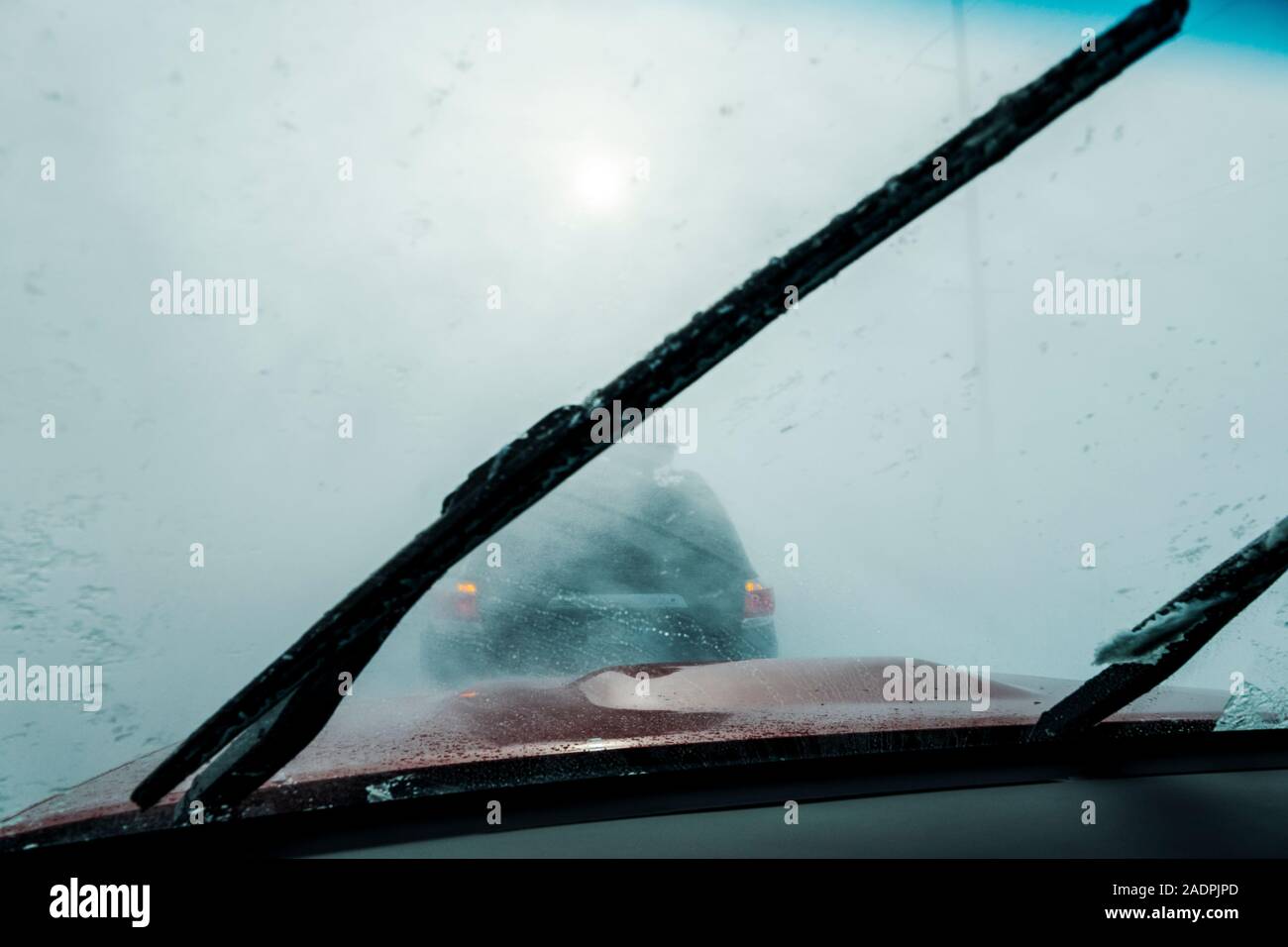 Windshield view of hazardous snow blizzard on highway 285; Park County ...