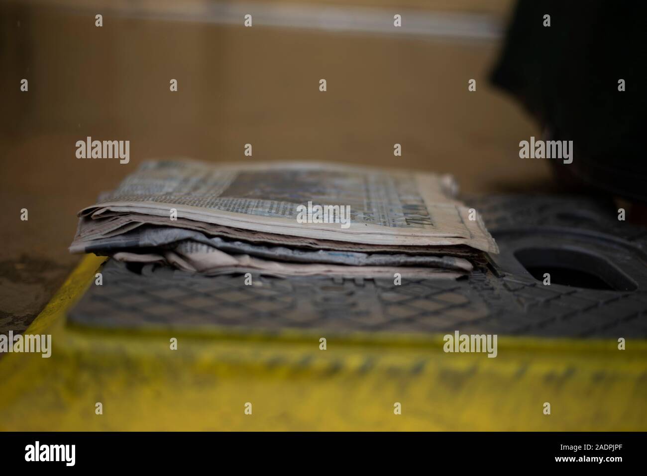 Wet newspaper hi-res stock photography and images - Alamy
