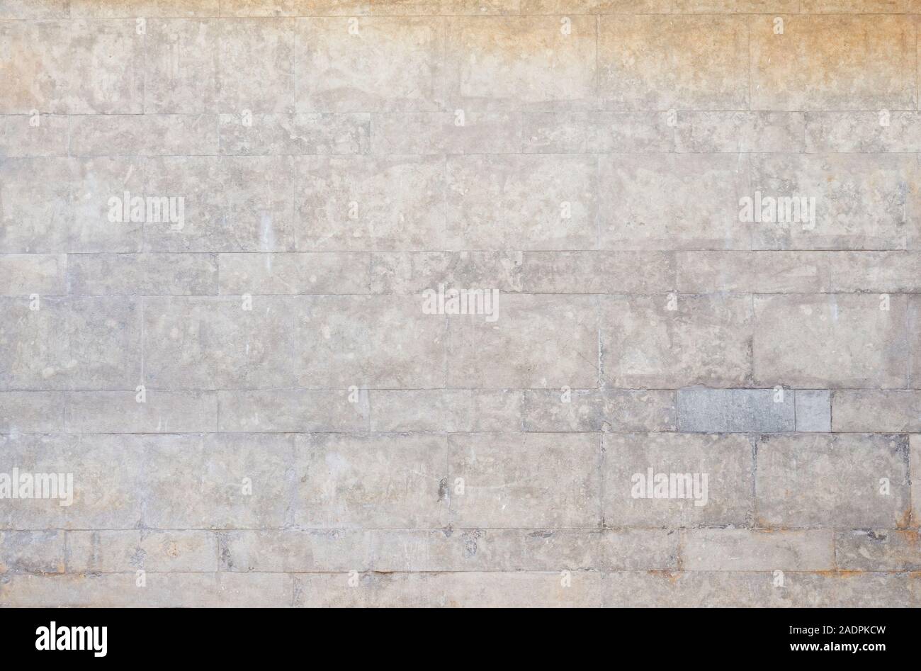 Old and weathered wall made of stone blocks. High resolution full frame ...