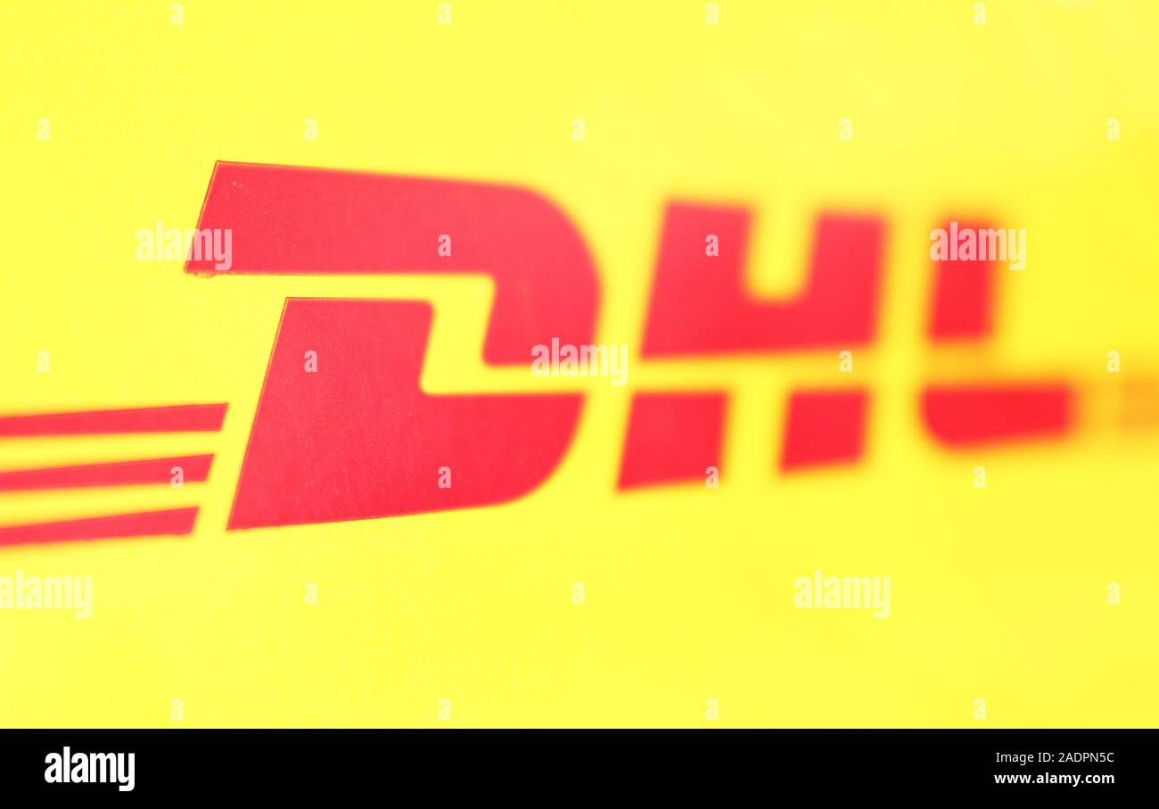 DHL company sign printed on the letter envelope Stock Photo - Alamy