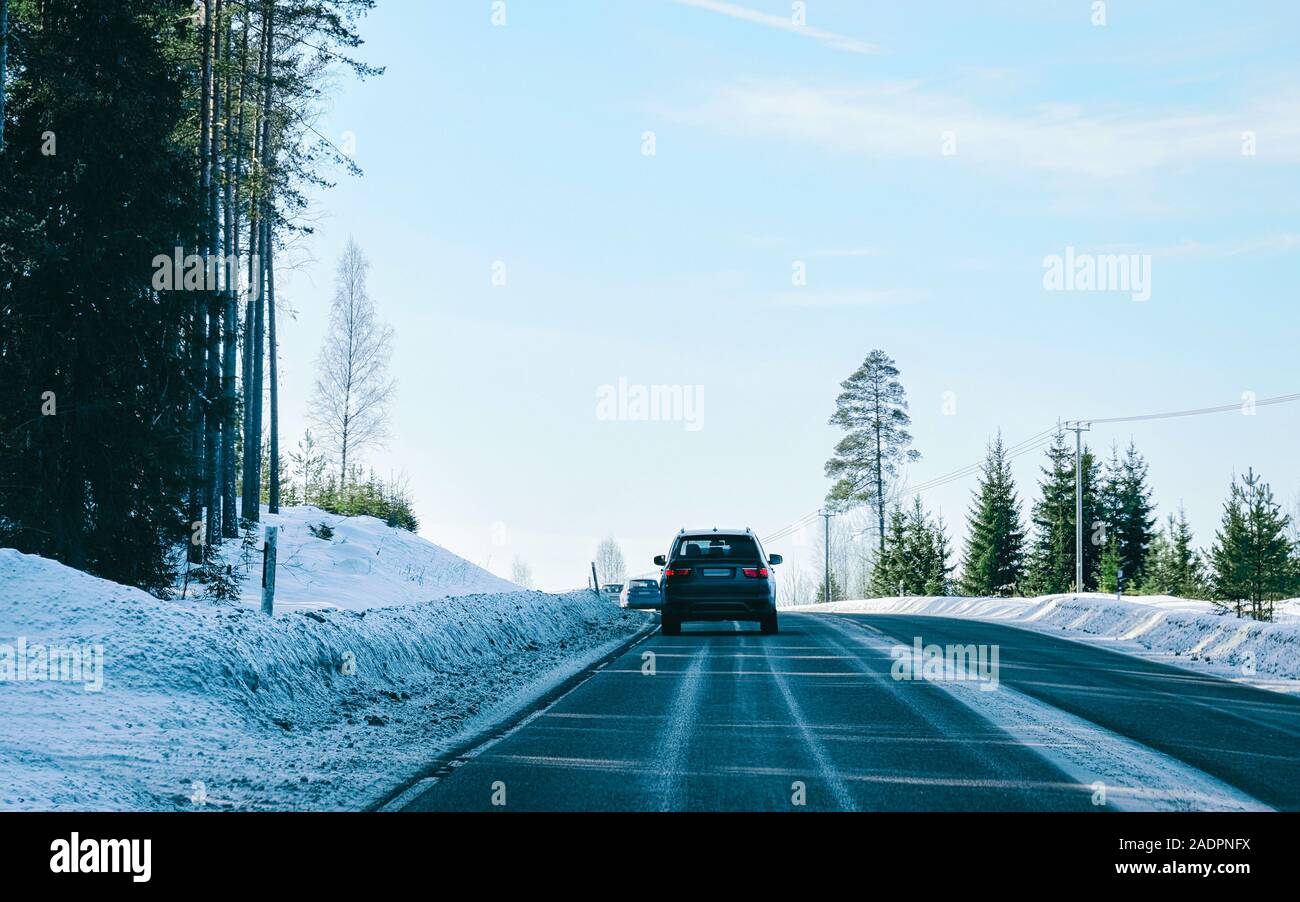 Landscape with car at road snowy winter Lapland reflex Stock Photo - Alamy