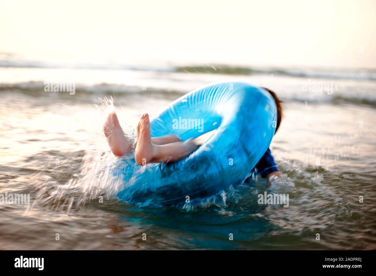 Boy falling over in water hi-res stock photography and images - Alamy