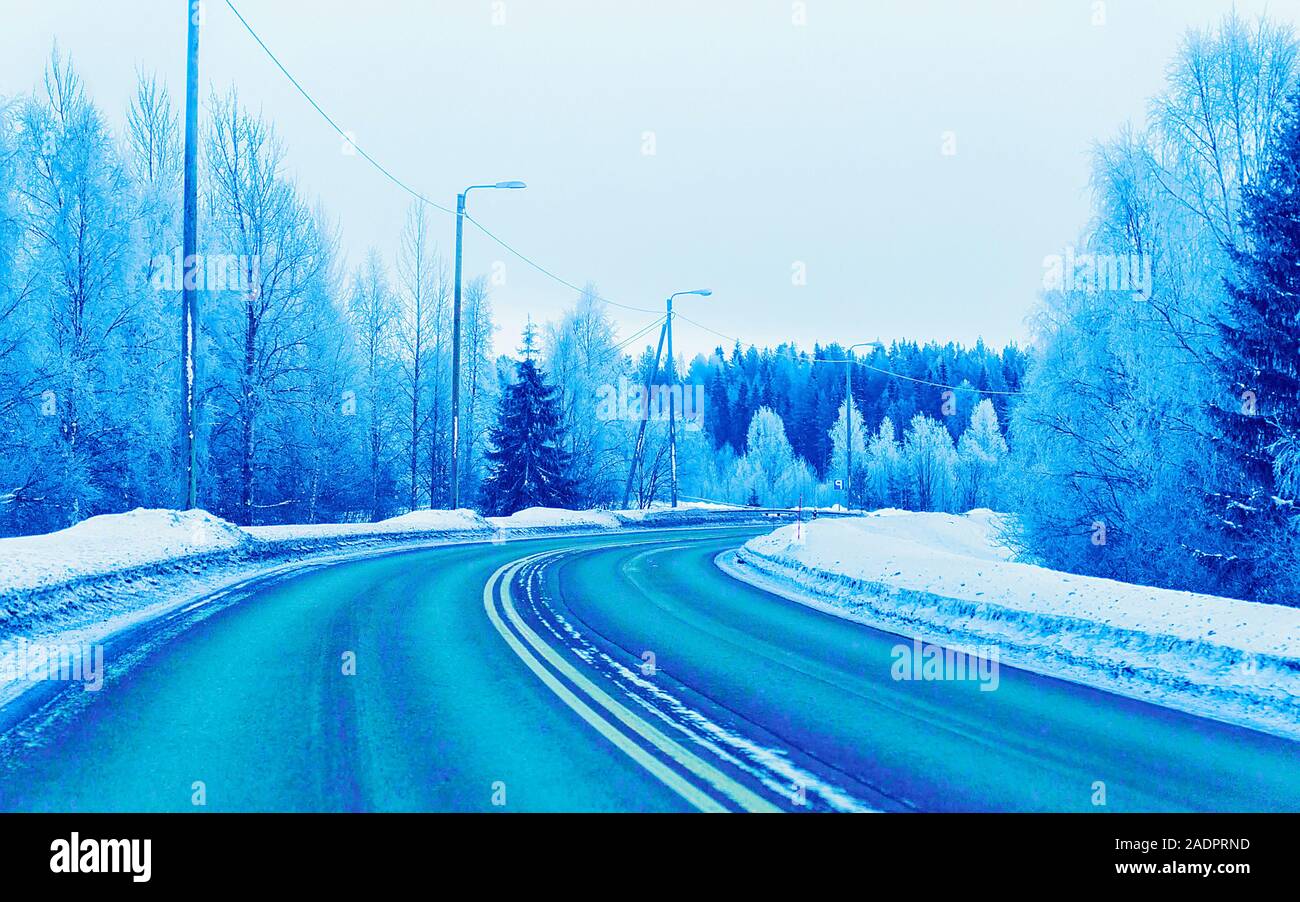 Winter road on Snow Forest in Cold Finland in Lapland reflex Stock ...