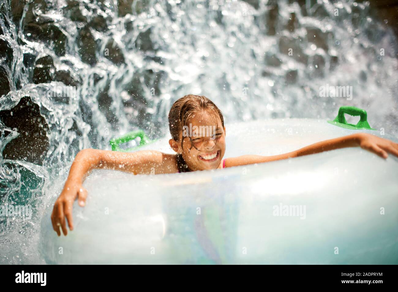 People being splashed water water hi-res stock photography and images ...
