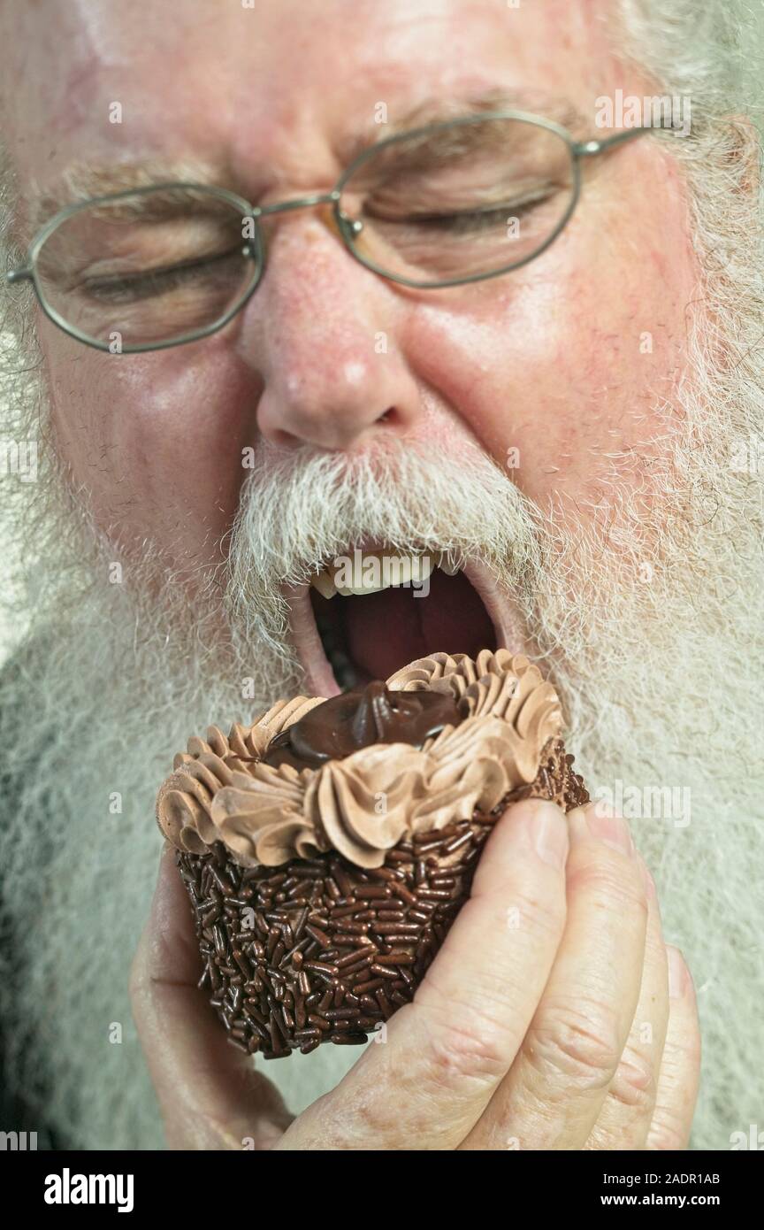 A senior man eating sweets hi-res stock photography and images - Alamy