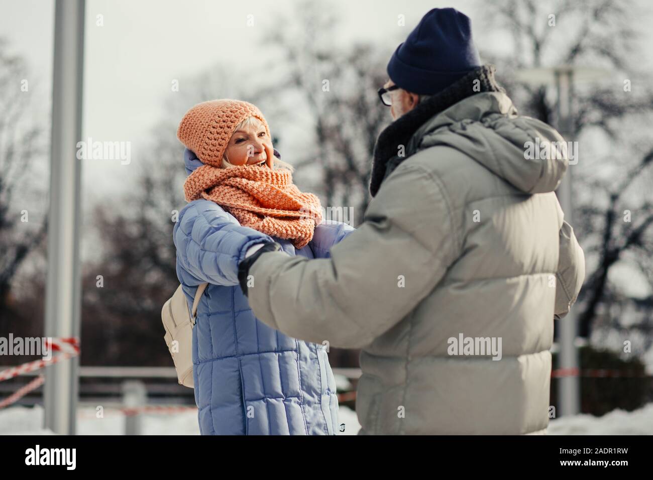 Happy senior woman spinning while dancing with husband Stock Photo - Alamy