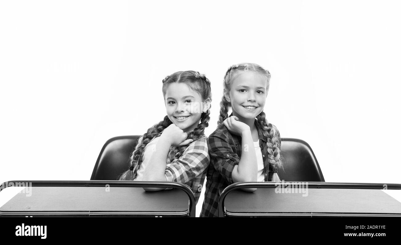 Quenching their thirst for knowledge. Cute little school having lesson ...