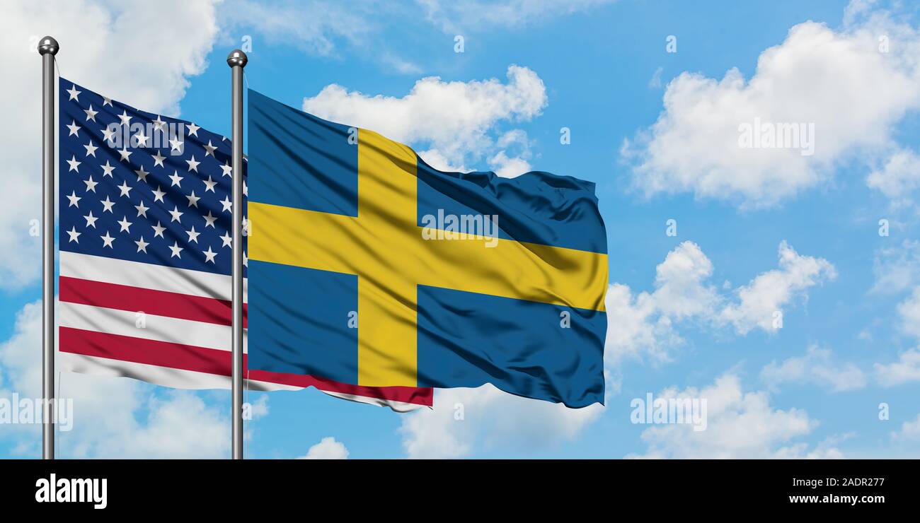 United States and Sweden flag waving in the wind against white cloudy ...