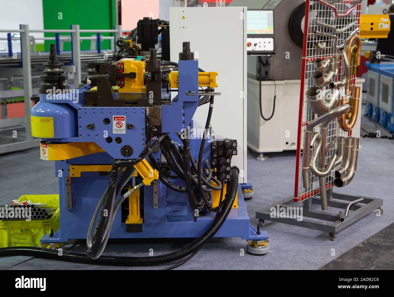 3D Pipe bending machine and pipe bending products Stock Photo - Alamy