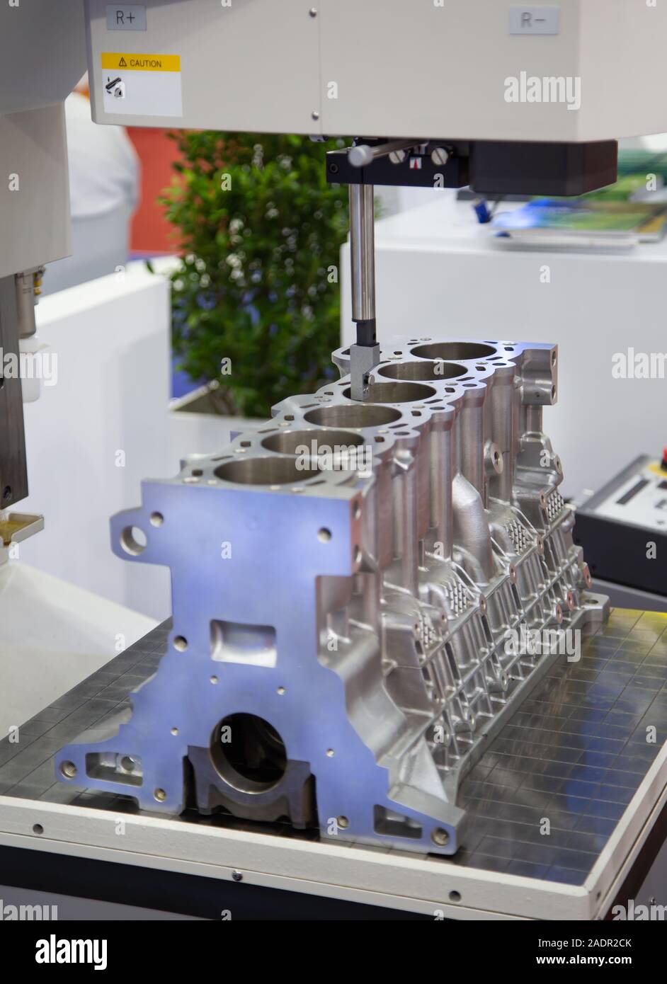 CMM Coordinate Measuring Dimension Machine inspecting engine part Stock ...