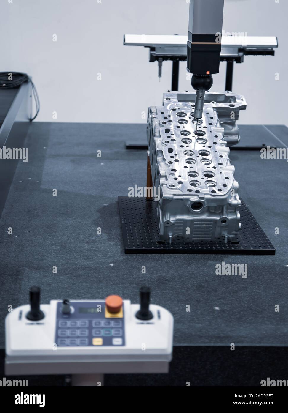 CMM Coordinate Measuring Dimension Machine inspecting engine part Stock ...