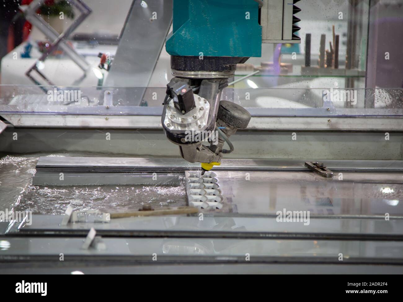 Modern industry CNC abrasive water jet cutting machine Stock Photo - Alamy